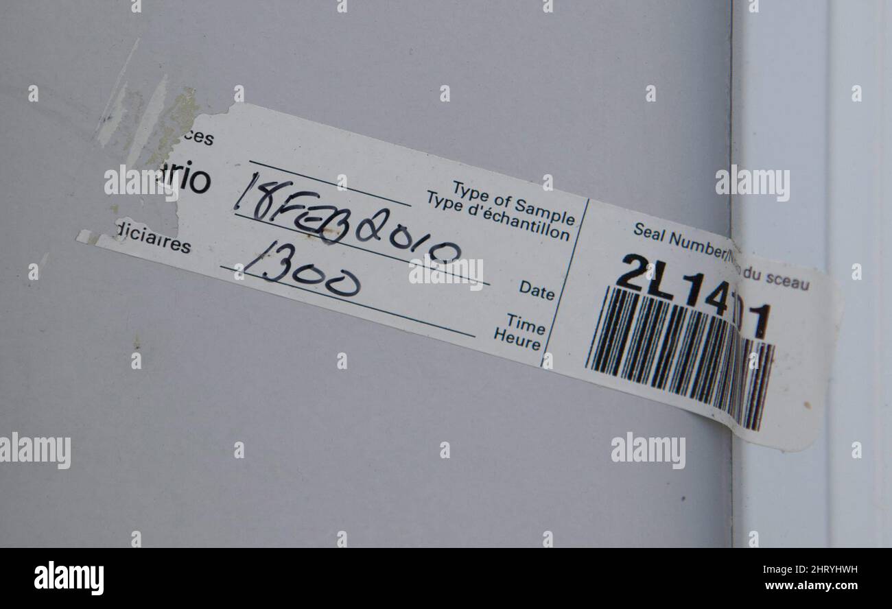 A police evidence tag dated February 18, 2010 is seen on the front door ...
