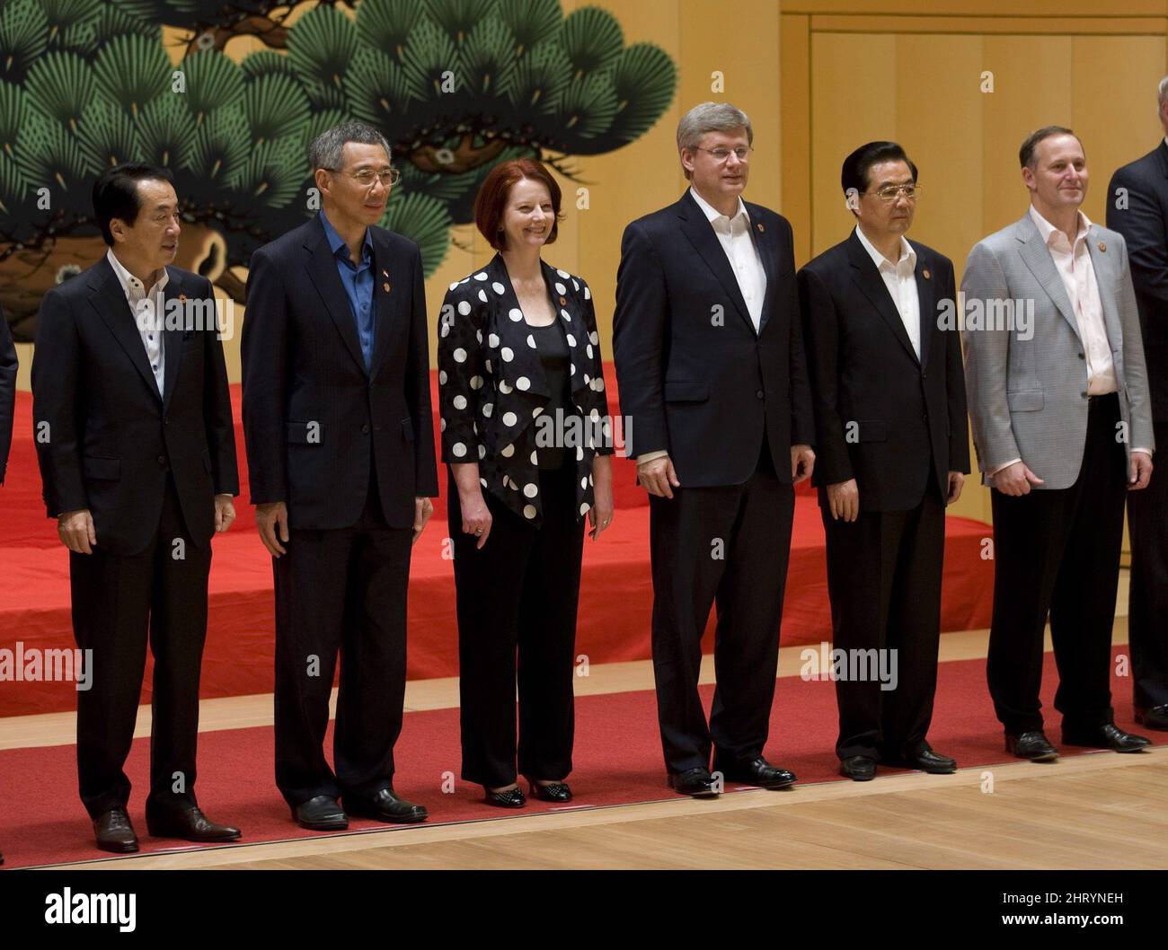 Canadian Prime Minister Stephen Harper stands with Japanese Prime ...