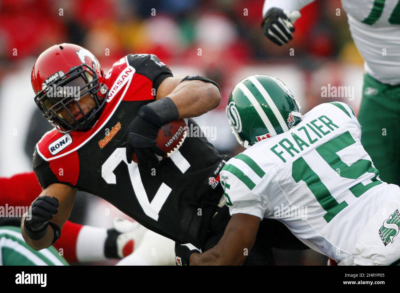 Saskatchewan Roughriders Lance Frazier, right, brings down Calgary ...