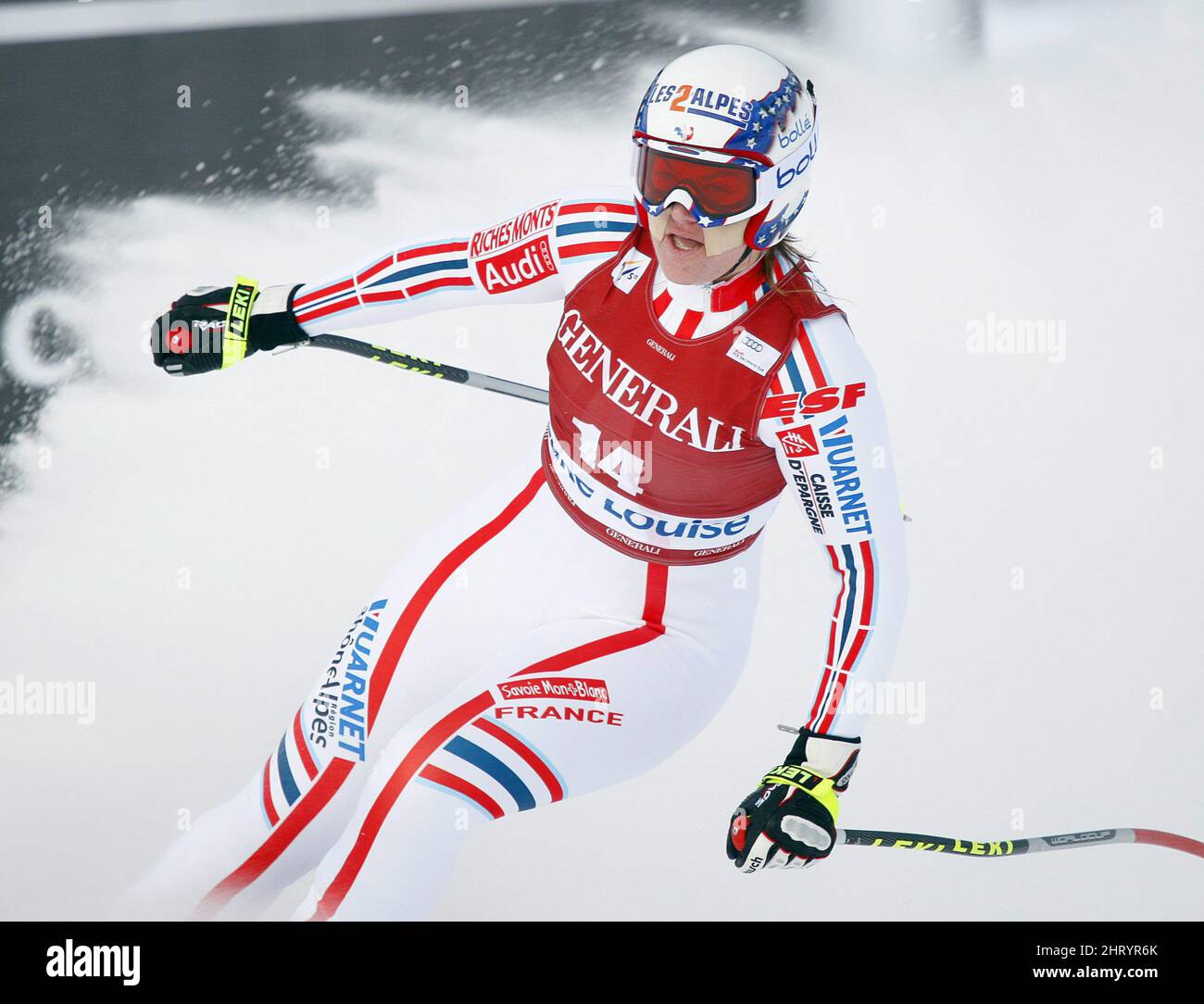 France's Marion Rolland crosses the finish line in seventh place during ...