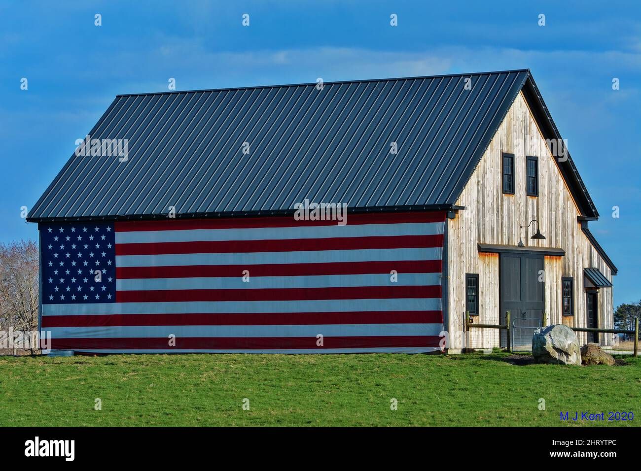 Wooden house with the USA flag on the wall in the North Hampton Stock ...