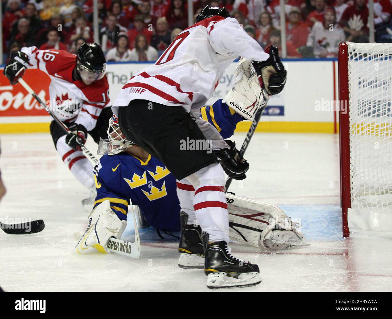 Team Canada Curtis Hamilton, left, scores the fourth goal against ...