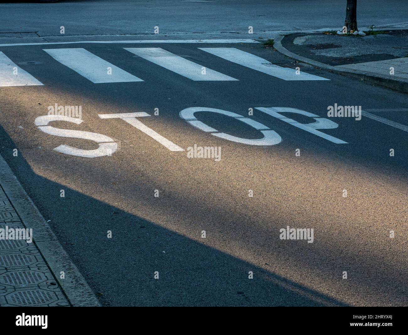 STOP sign and crosswalk Stock Photo - Alamy