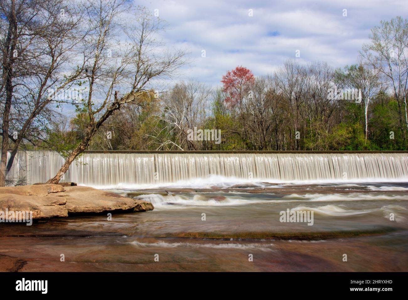 Fantastic view of a beautiful waterfall and the trees in the beginning ...