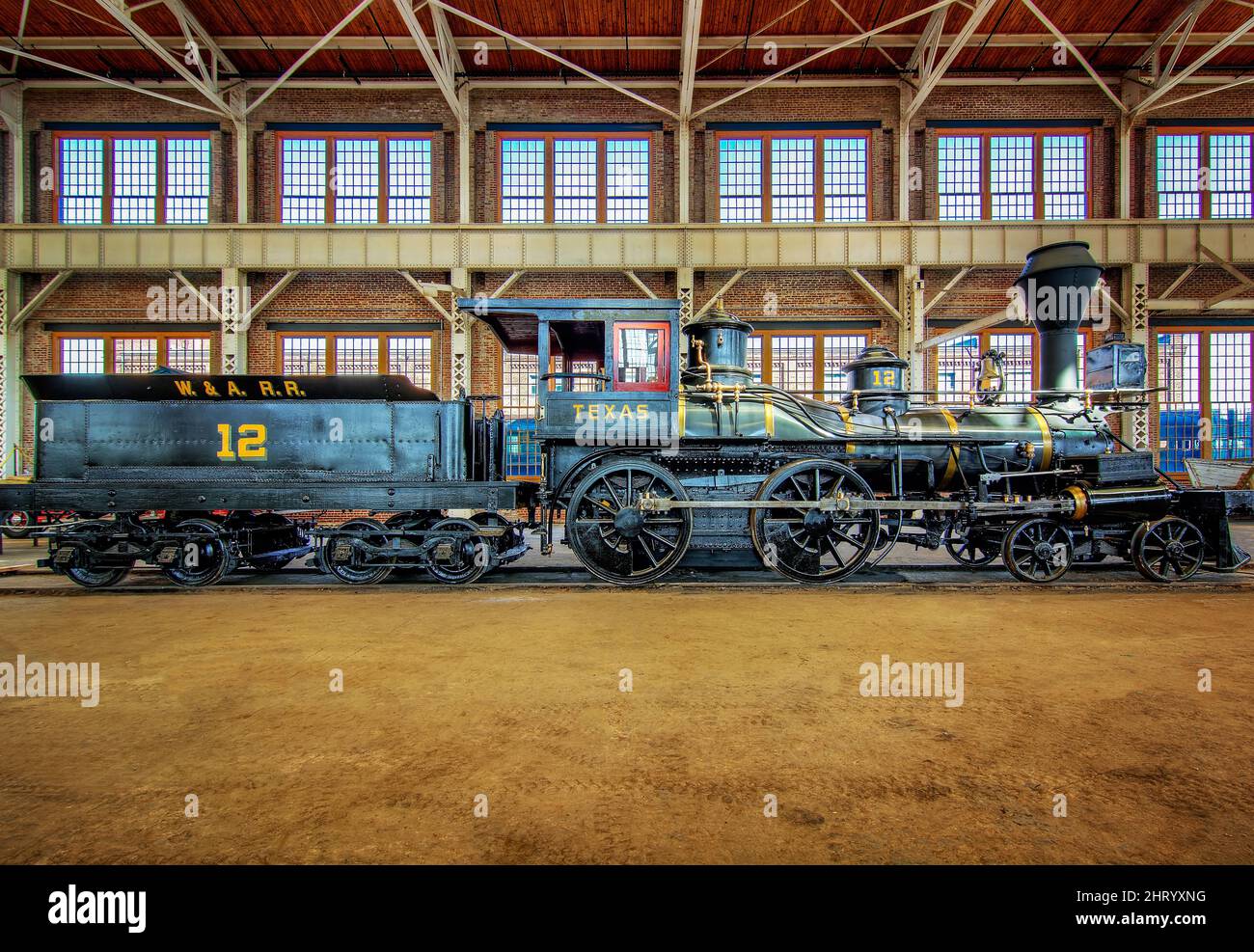 Old blue steam locomotive in a factory Stock Photo - Alamy