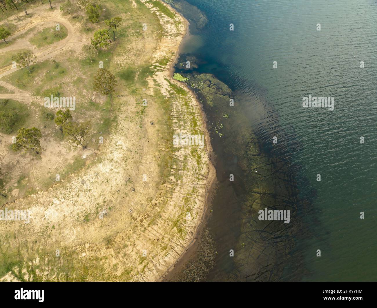 Eungella Dam Queensland Australia with low water levels showing texture ...