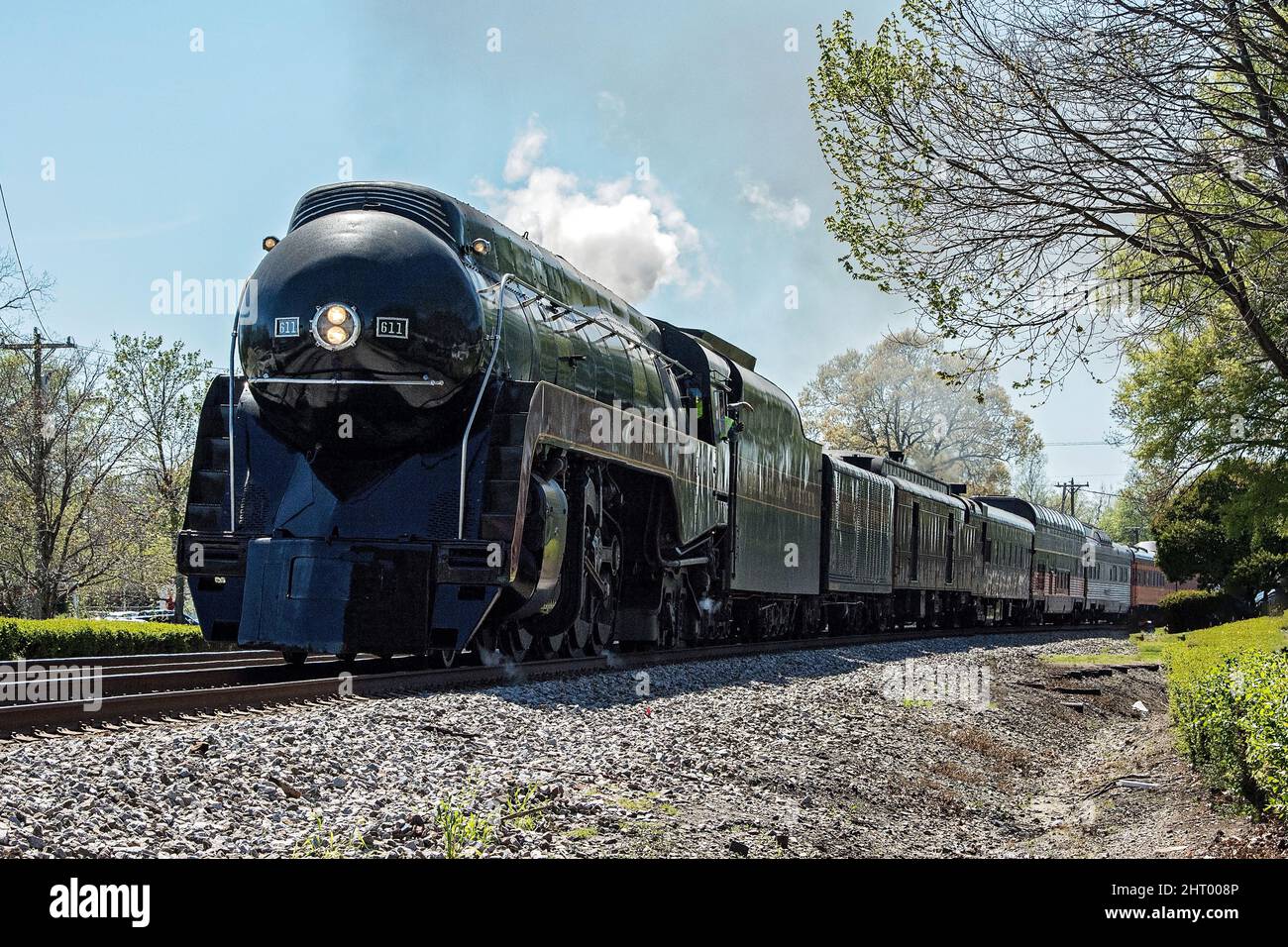 A black steam locomotive on the railroad during the daytime Stock Photo ...