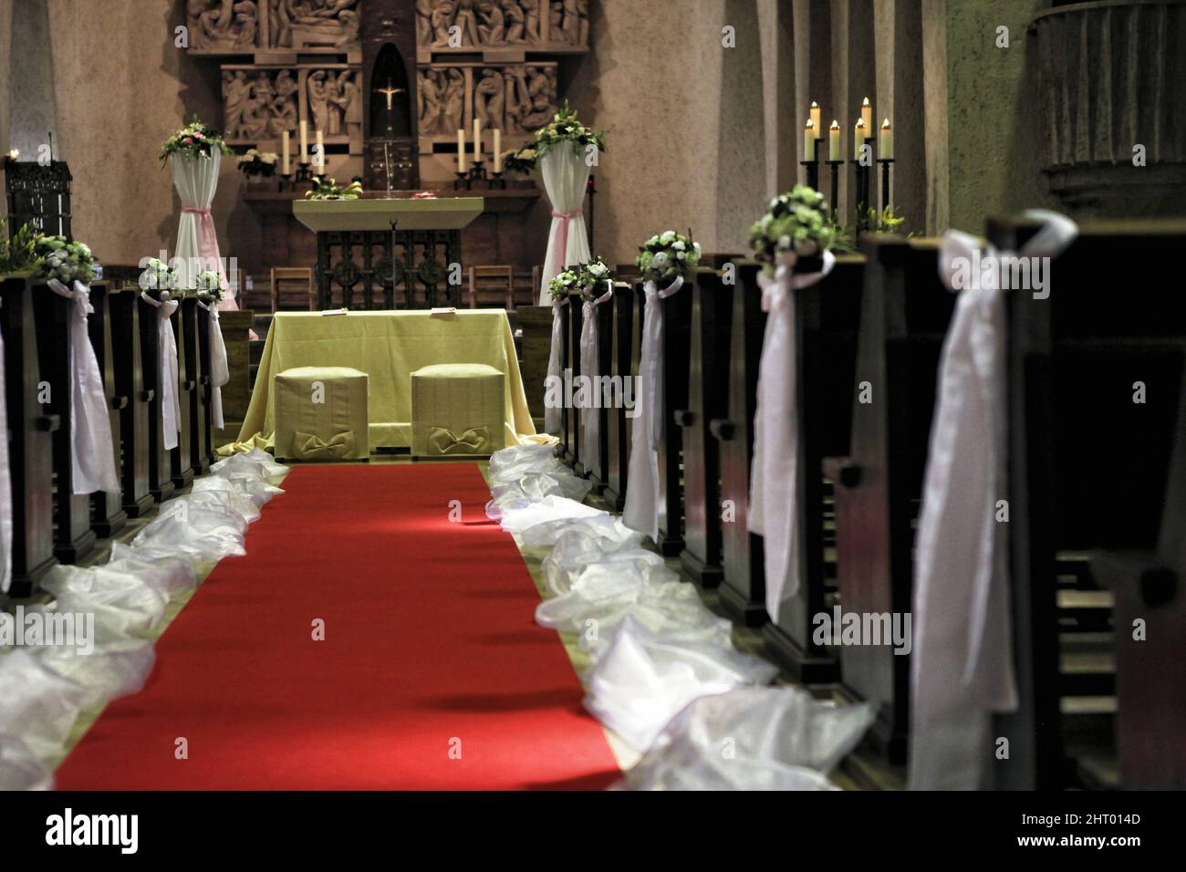 Decorated church interior for a wedding Stock Photo - Alamy