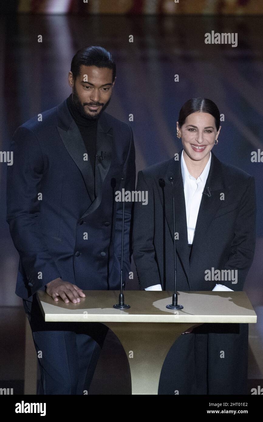 Paris, France. 25th Feb, 2022. Djebril Zonga and Amira Casar are seen ...
