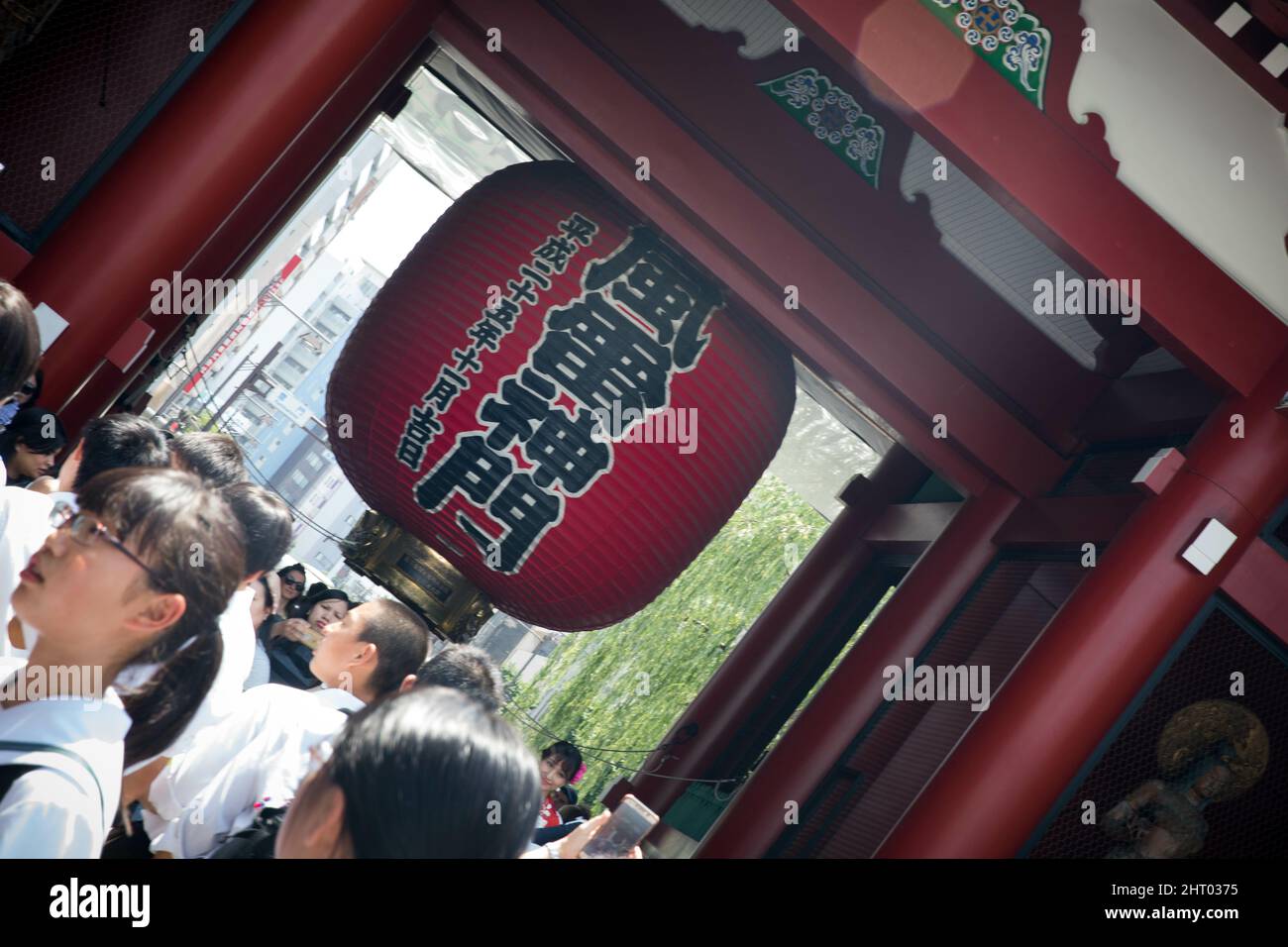 Closeup shot of people standing near the temple in summer Stock Photo ...