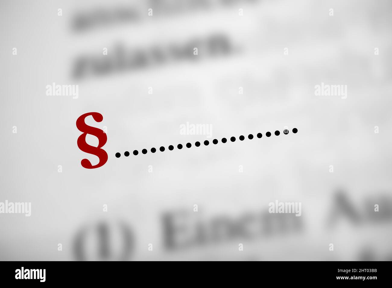 Closeup shot of the section sign and the dotted line on the blurry ...