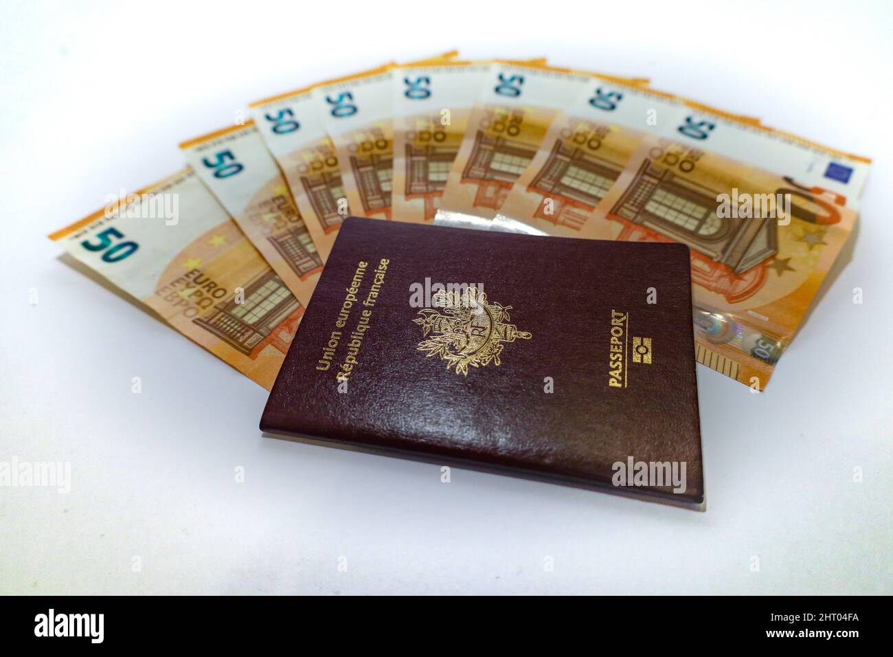 Closeup shot of 50 euro banknotes and French passports isolated on ...
