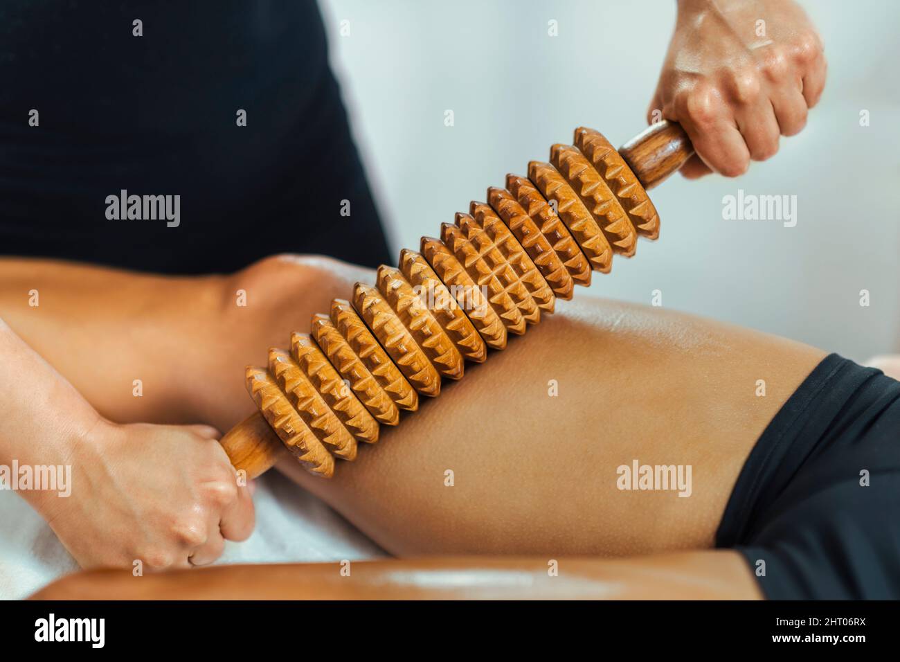 Rolling pin maderotherapy massage Stock Photo - Alamy