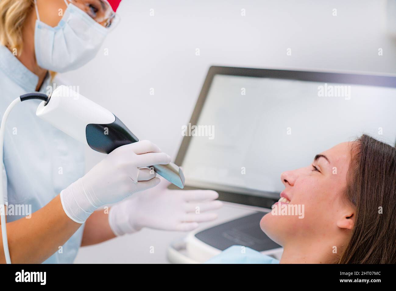 Dentist using 3D dental camera for scanning teeth Stock Photo - Alamy