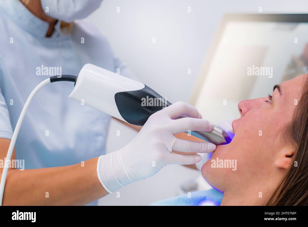 Dentist using 3D dental camera for scanning teeth Stock Photo - Alamy