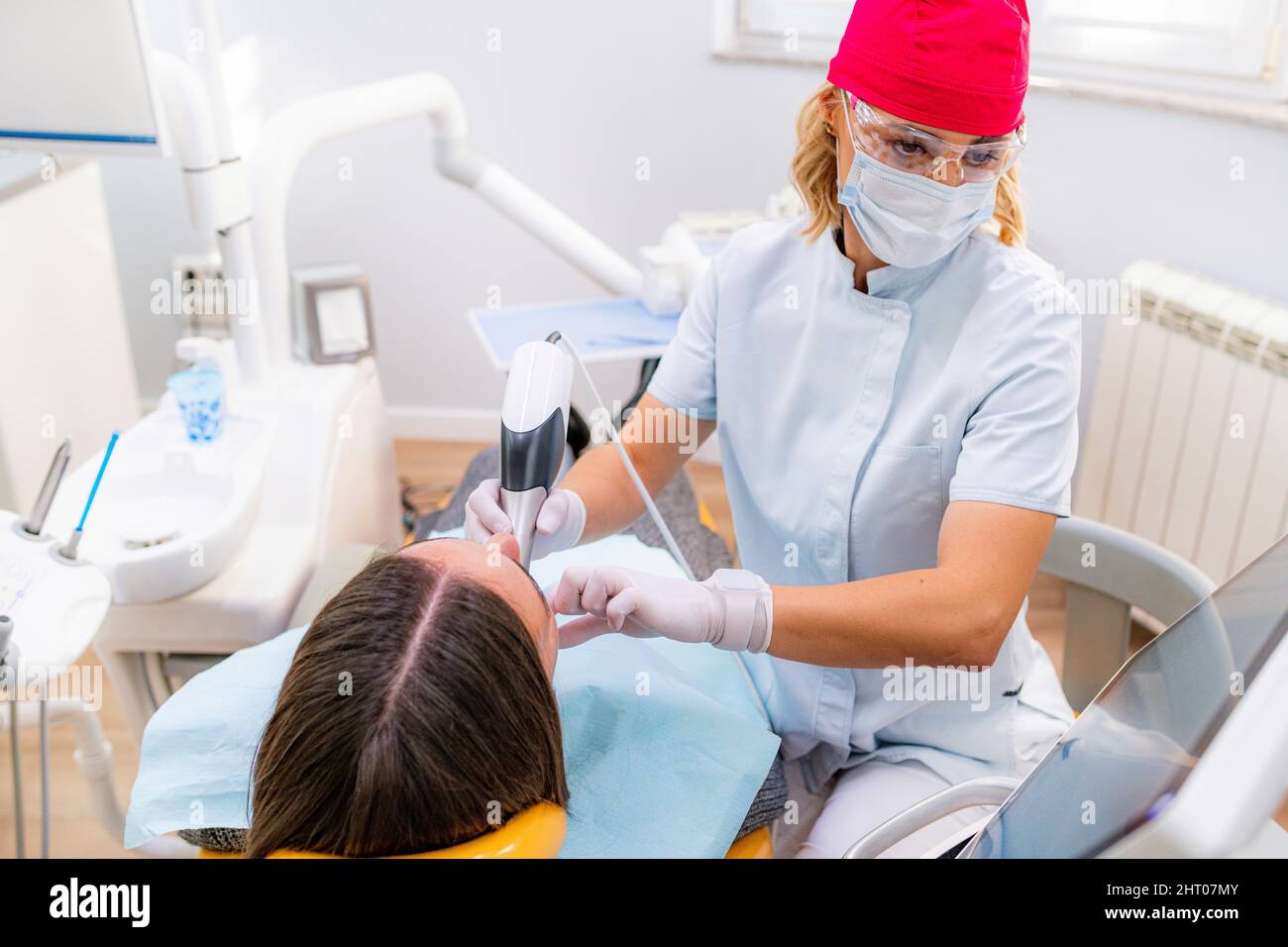 Dentist using 3D camera for tooth reconstruction procedure Stock Photo ...