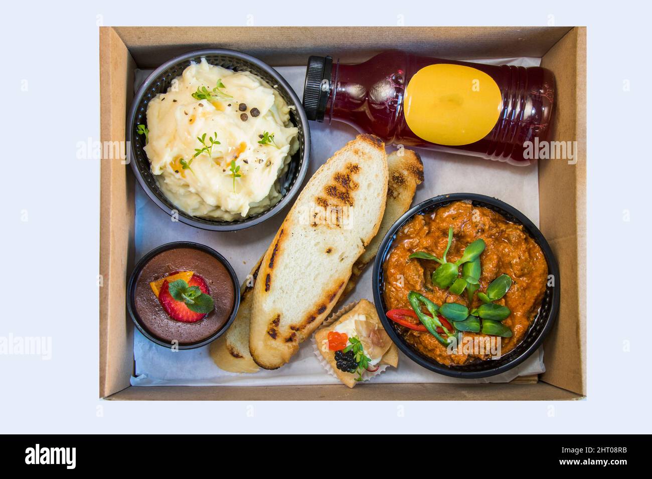 Georgian lunch box view, meat and potatoes Stock Photo - Alamy