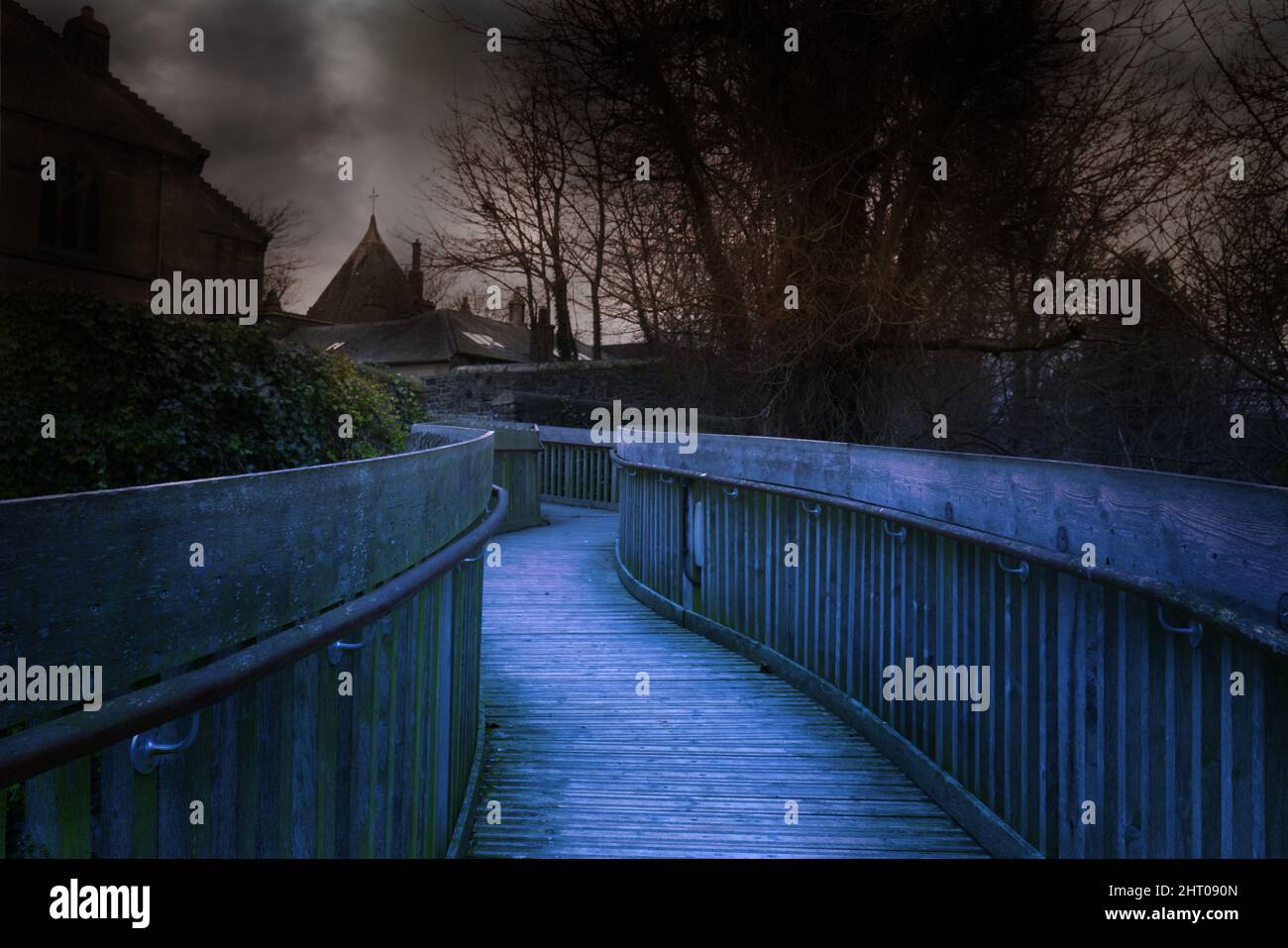 A wooden bench on the side of a river. The composition brings a memory ...
