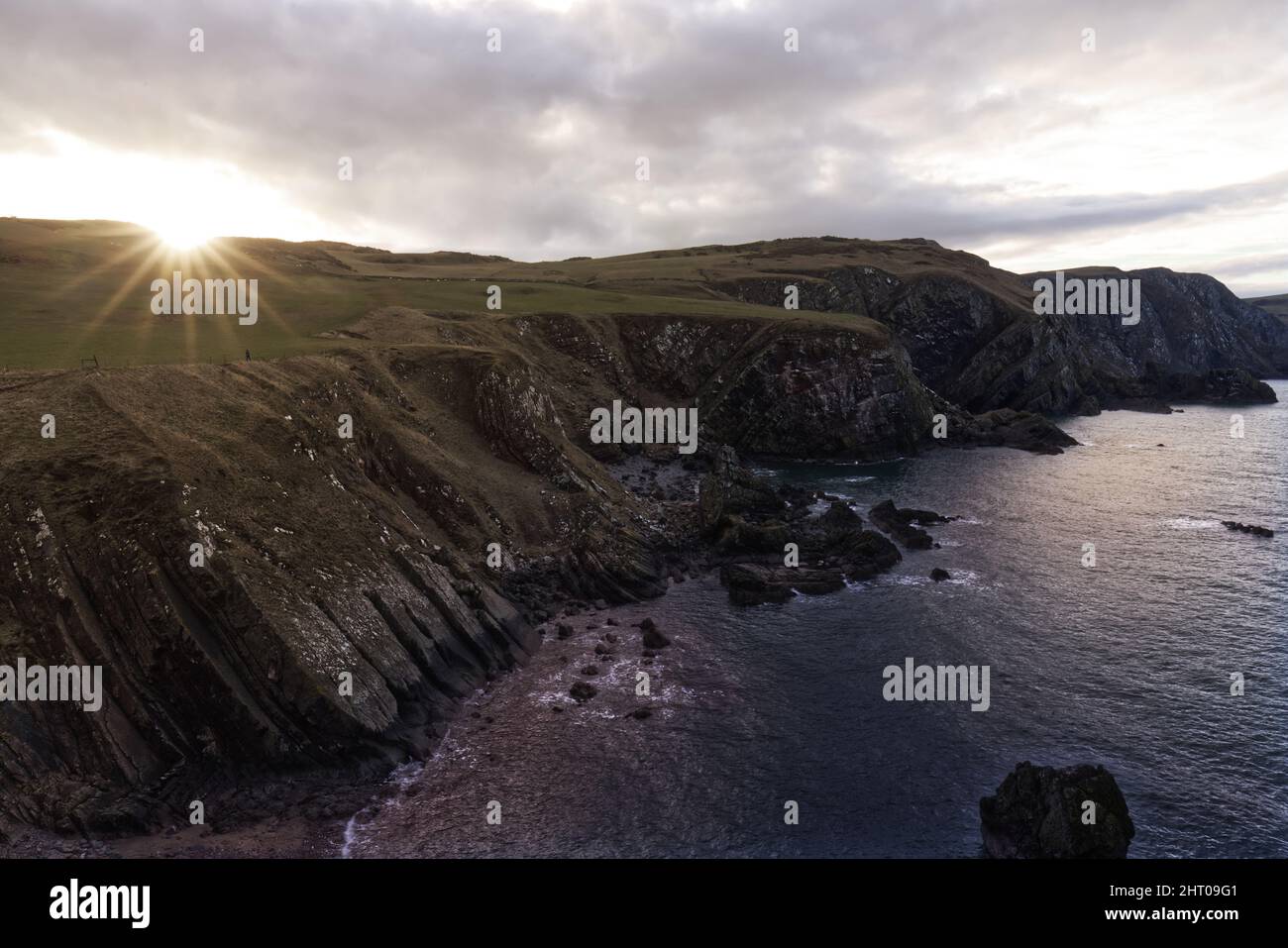 Sunset at Dunbar, Scotland. Here we can observe the Scottish coast with ...