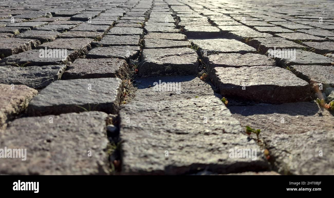 Damaged cobblestones hi-res stock photography and images - Alamy
