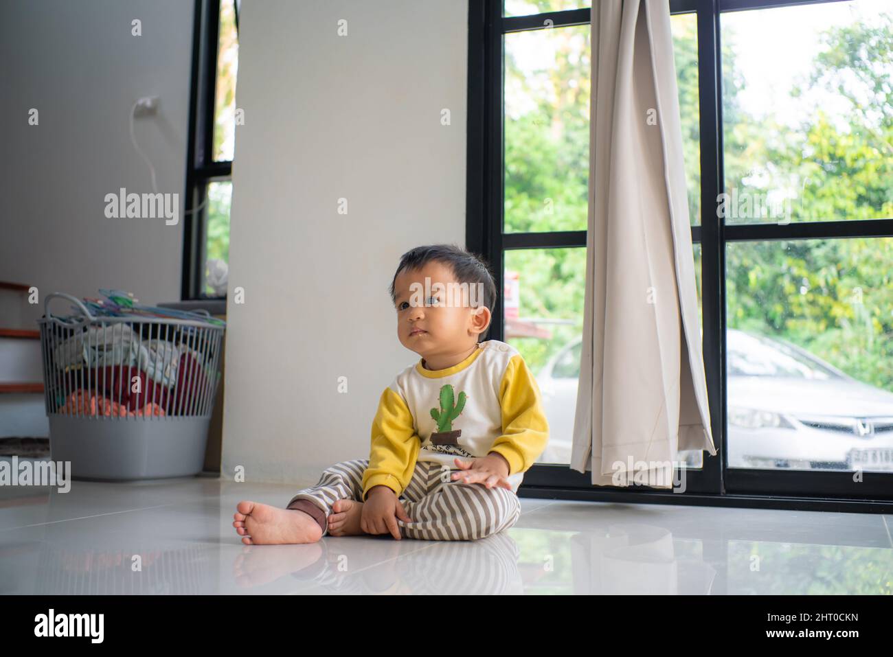 Baby toddler kids boy playing mirror window in modern house, Baby in ...
