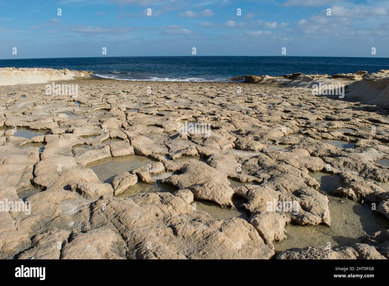 Limestone wave-cut platform along coast of Delimara - coastal ...