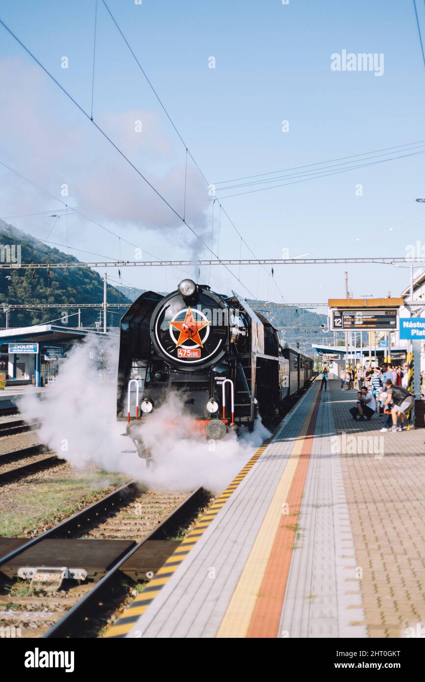 Vertical shot of the steam engine locomotive 475.196 leaving the train ...