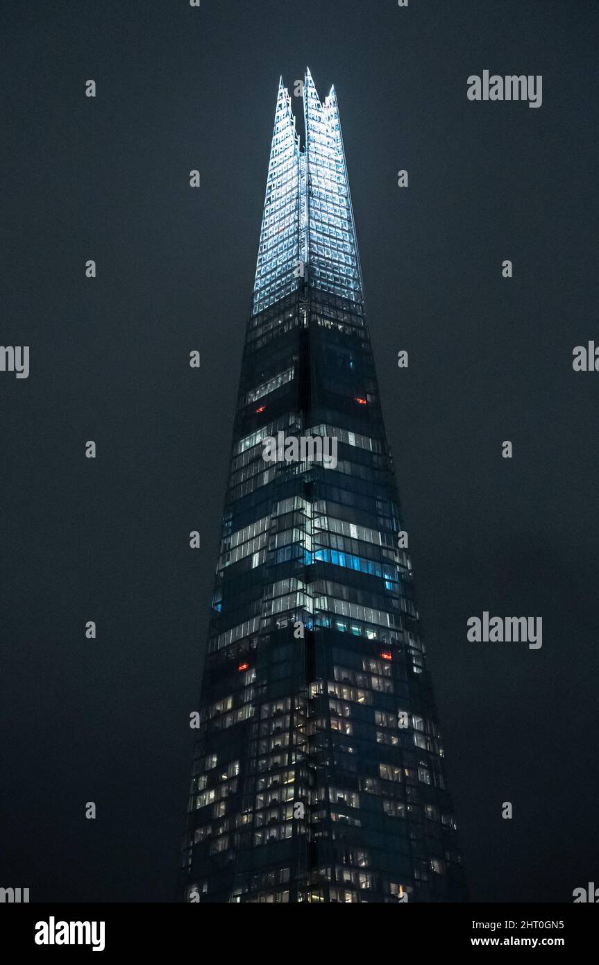 Low-angle shot of the Shard Skyscraper at night in London, England ...