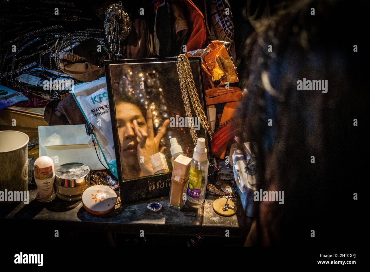 Bangkok, Thailand. 25th Feb, 2022. Thai drag queen Angele Anang applies ...