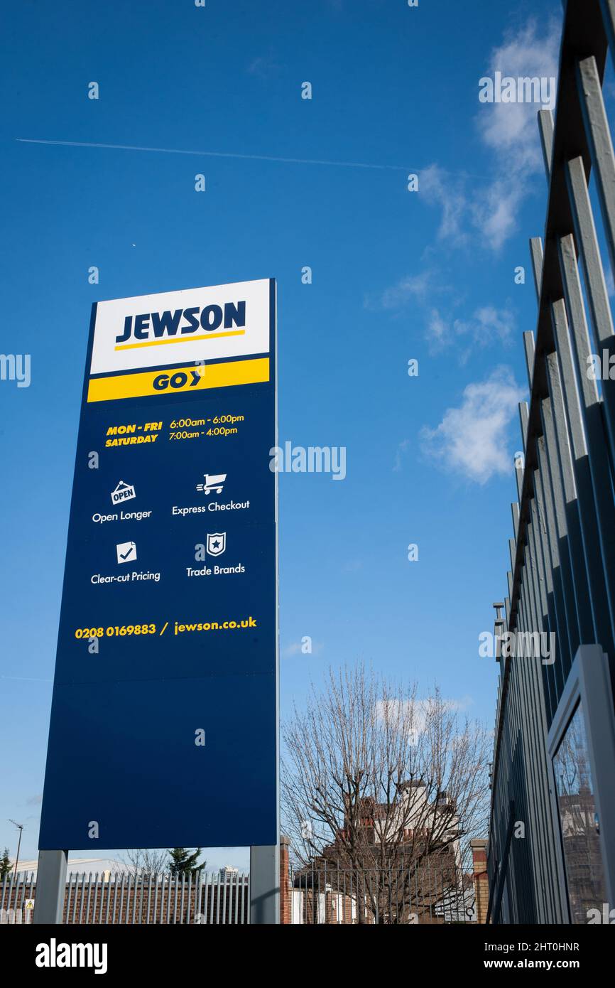 Vertical shot of Jewson Go sign in Charlton, London Stock Photo - Alamy