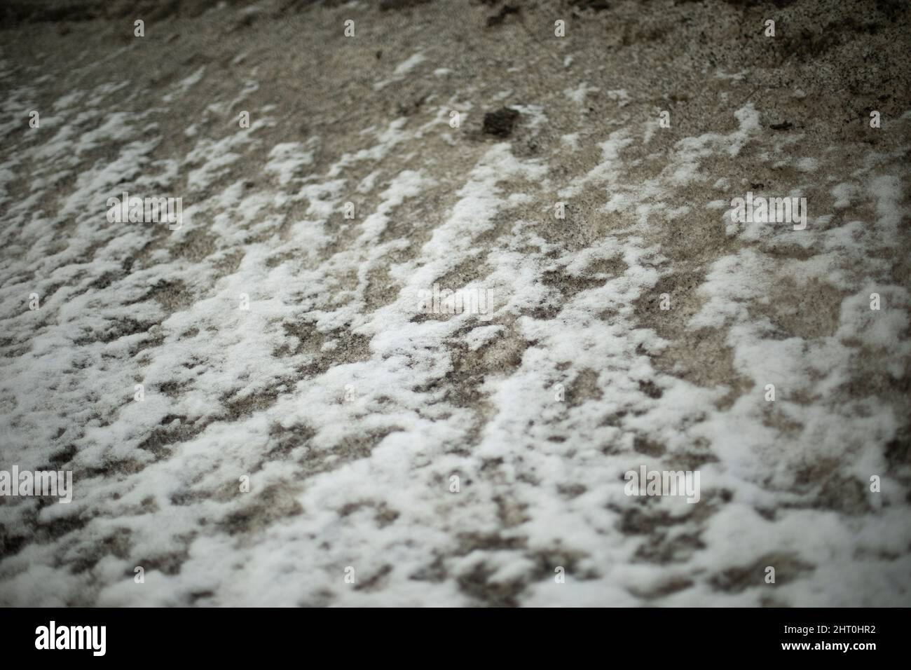 Texture of dirty snow. Side of road in winter. Gray and white. Frozen ...