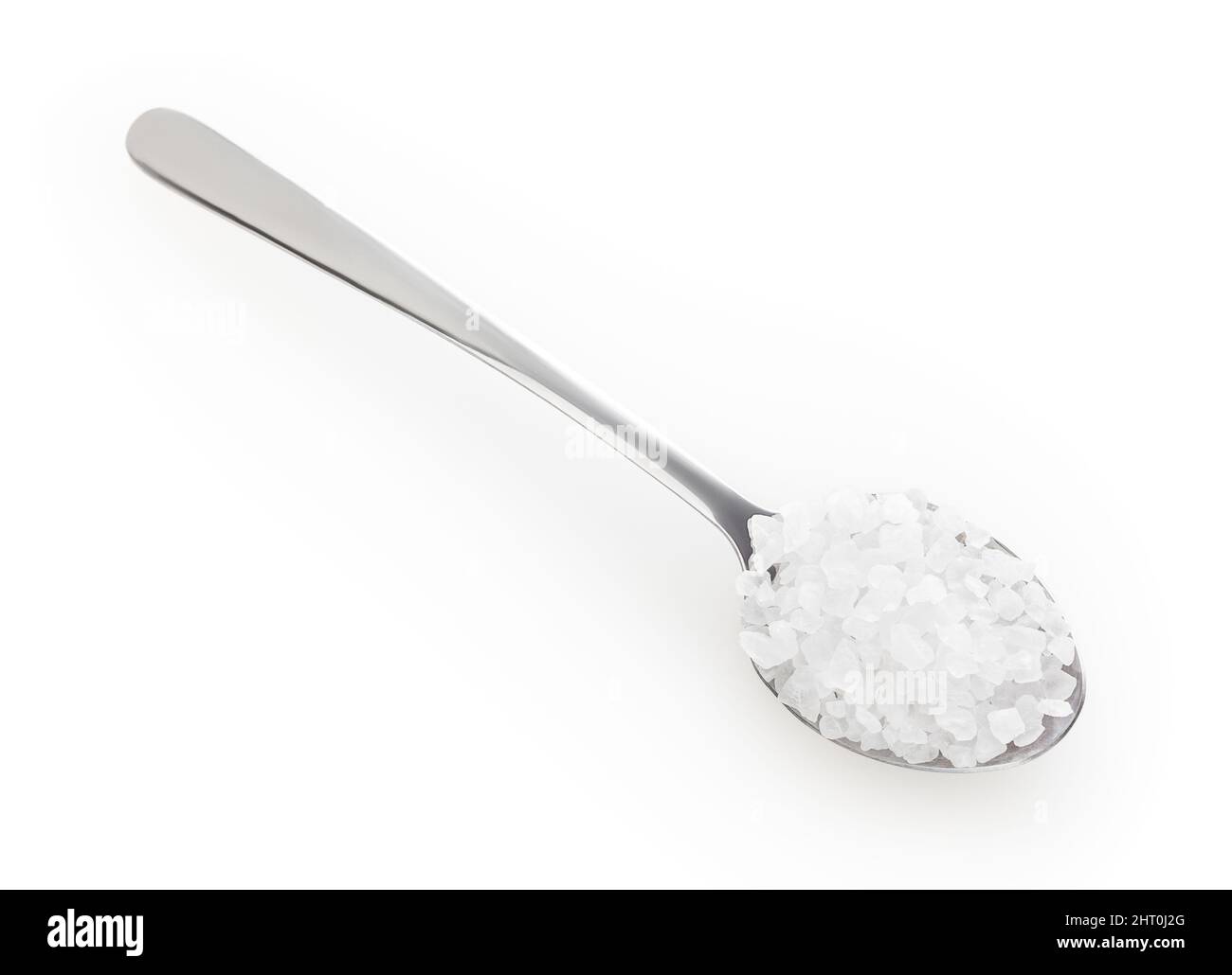 Spoon of sea salt isolated on white background with clipping path Stock ...