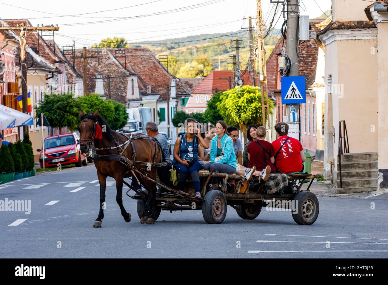 Horse carriage and farmer in Biertan Romania Stock Photo - Alamy