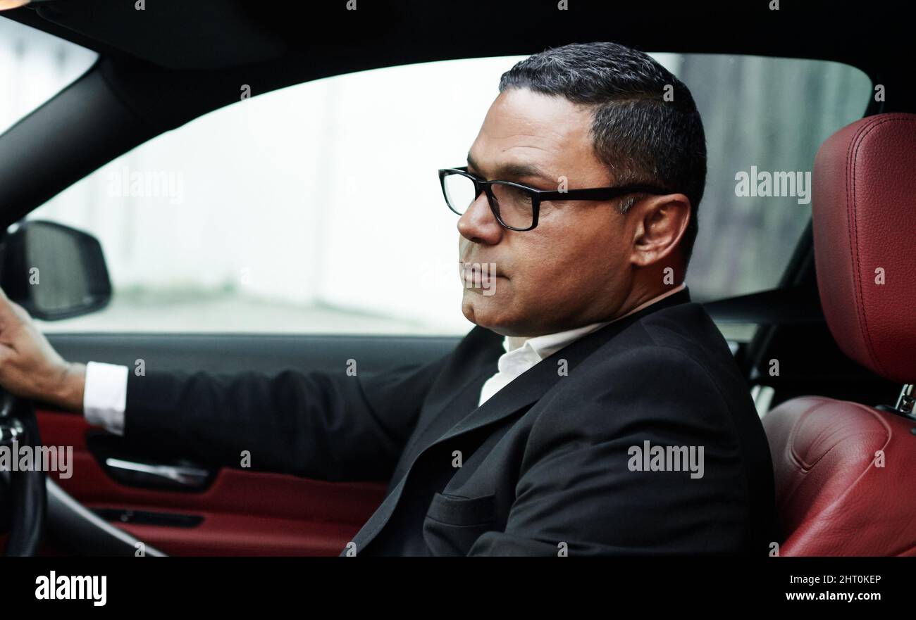 Heading into the office. Cropped shot of a handsome mature businessman ...