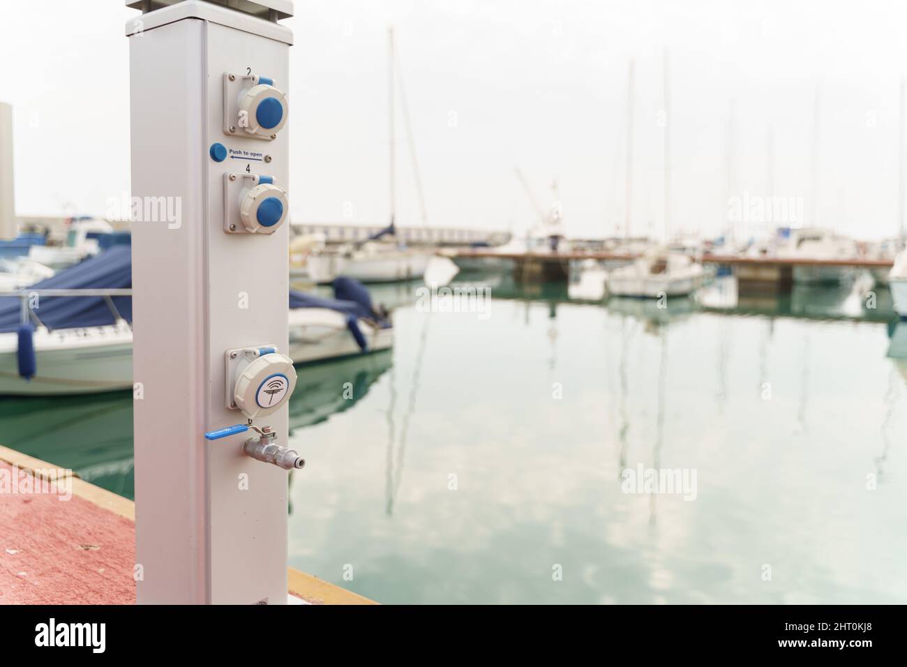 Supply post for water and electricity on a pier head for Yacht Marina ...