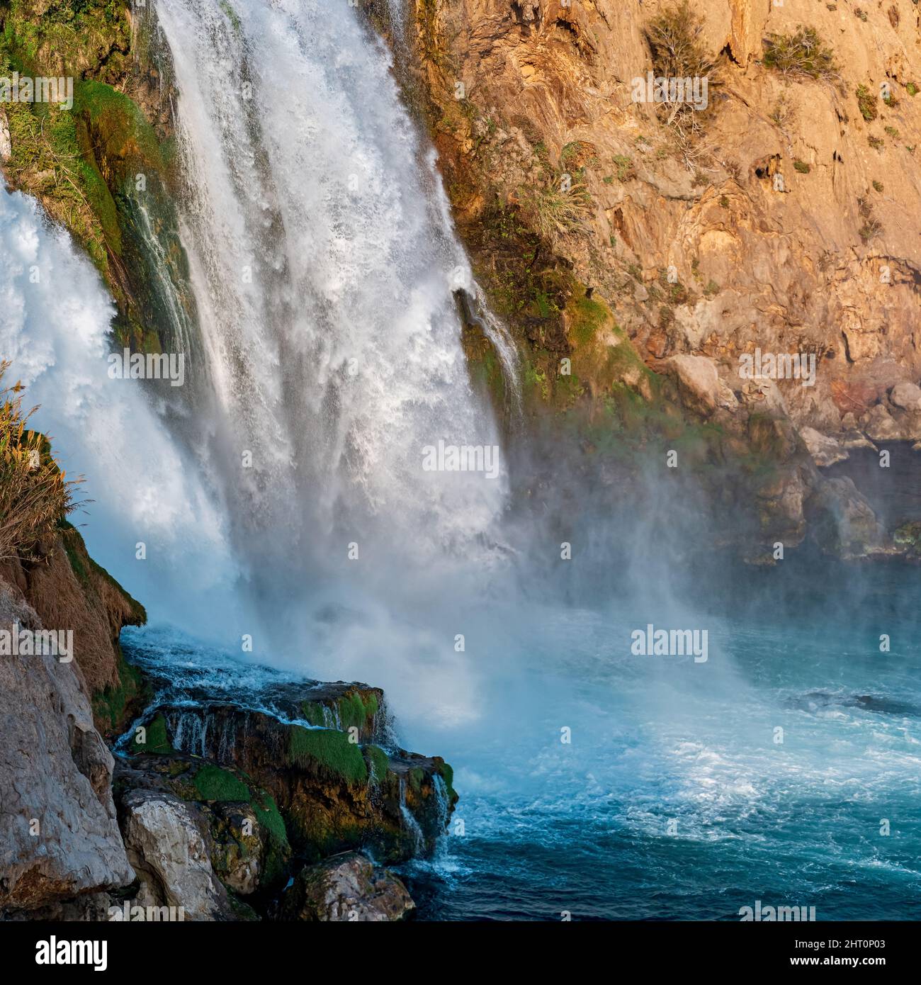 landscape at the foot of a large waterfall Stock Photo - Alamy