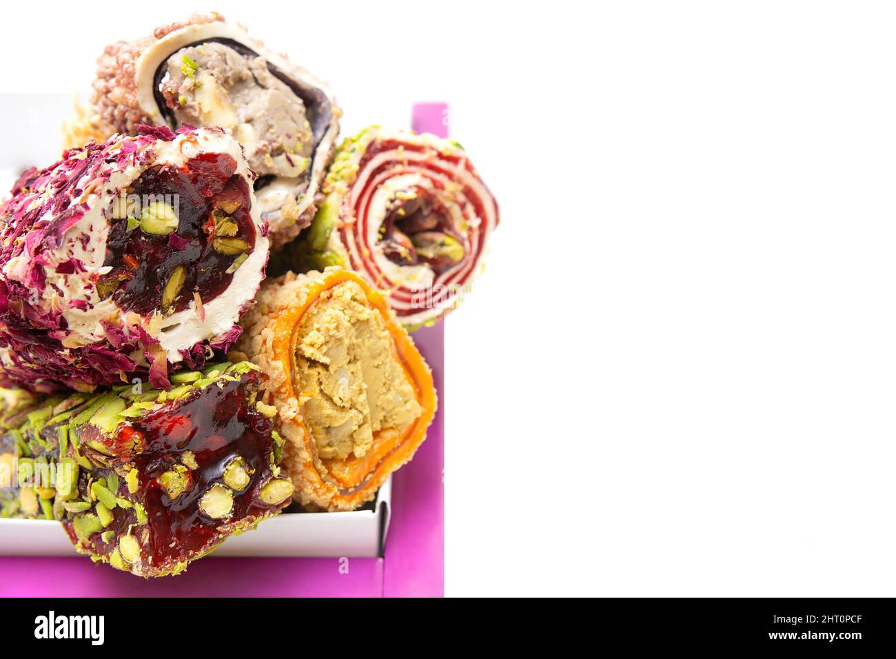 Assortment of turkish lokum in a gift box isolated on white background ...