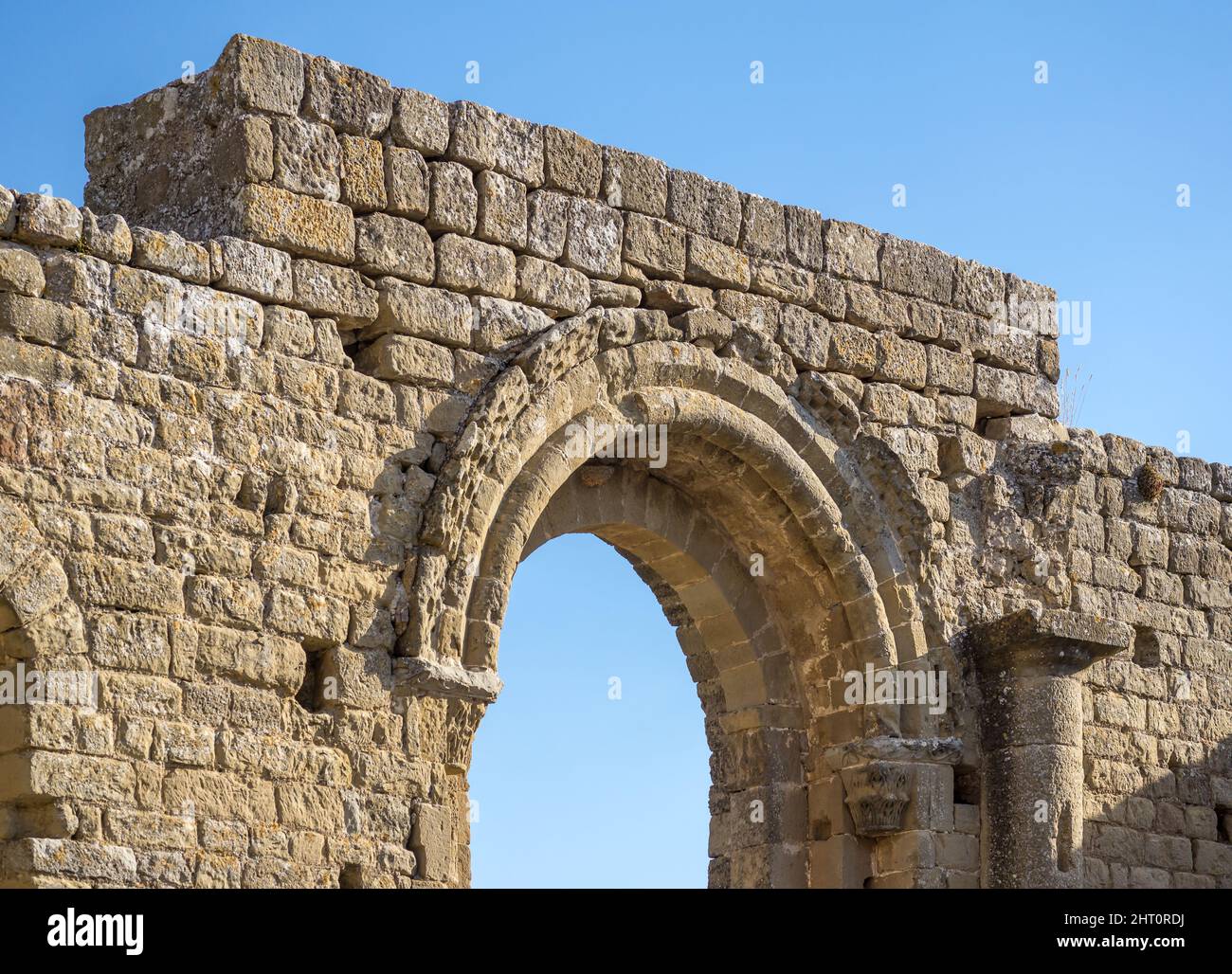 semicircular arch at the entrance of a small chapel Romanesque ...