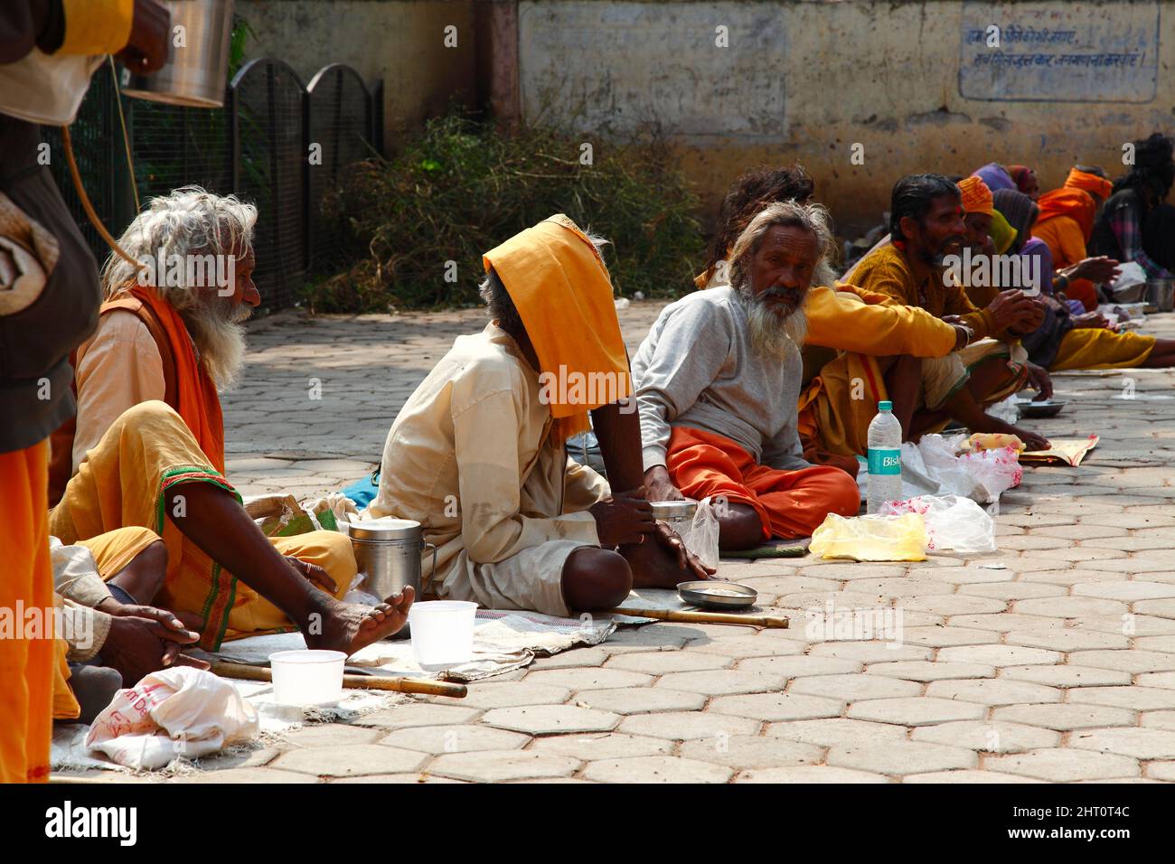 Holy Men seeking alms or food in front of Ram Raja Temple in Orchha ...