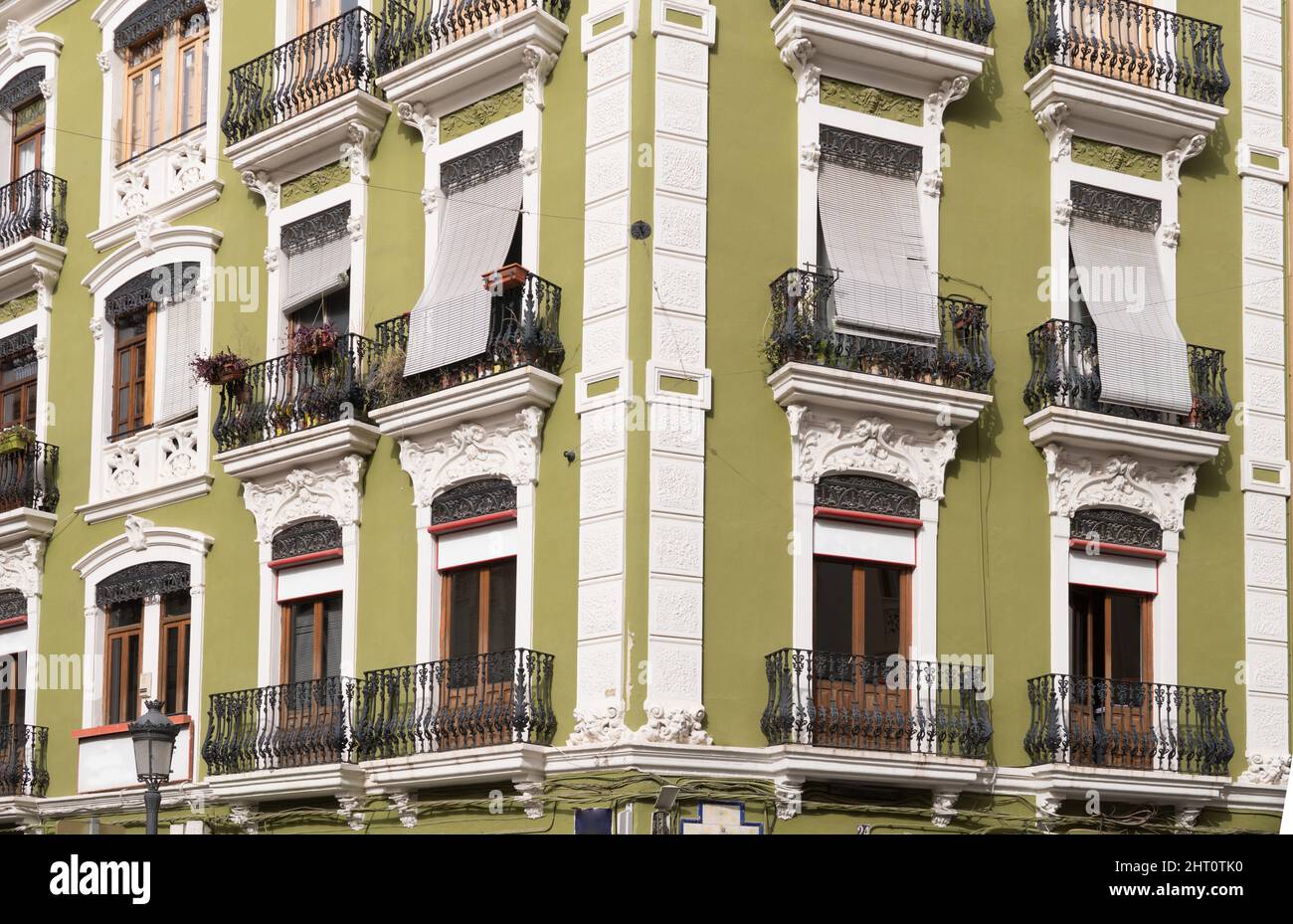 colorful green apartment building corner of green facade residential ...