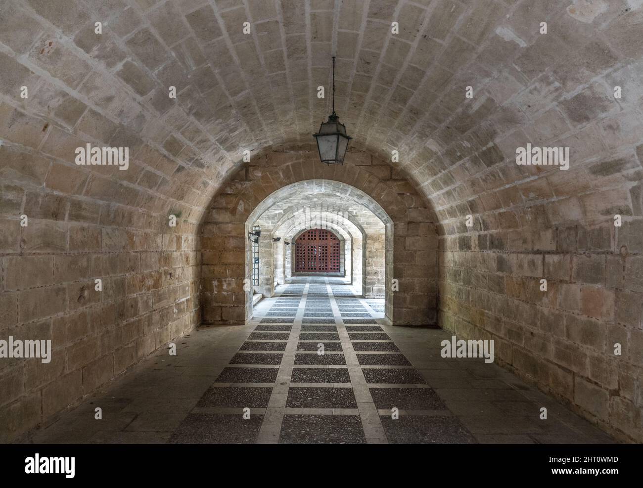 tunnel corridor with bars at the end light at the end of the tunnel ...