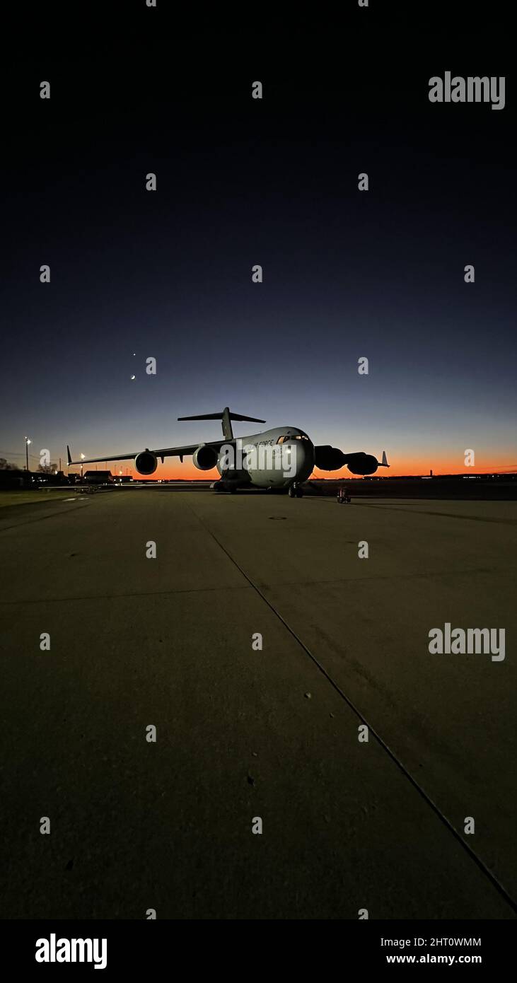 Vertical photo United States Air Force C-17 sitting on the parking ramp ...