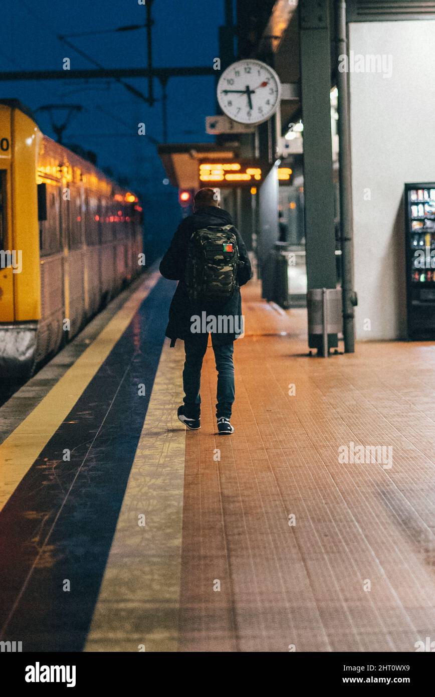 Urban scenery of a person at the underground metro at night Stock Photo ...