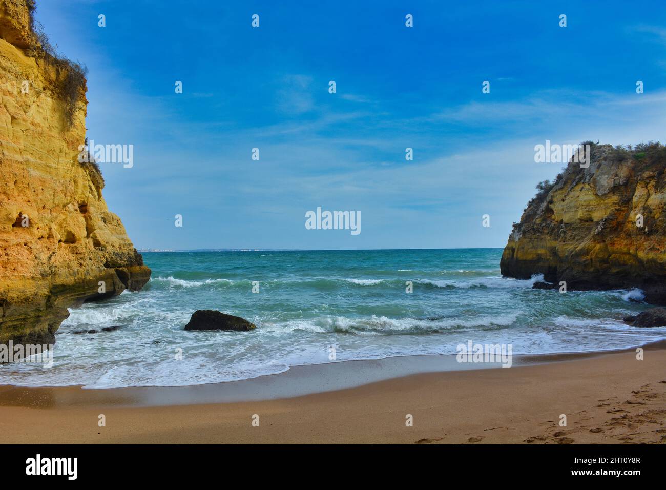 A beautiful beach view with rocky cliffs in Lagos, Portugal Stock Photo ...