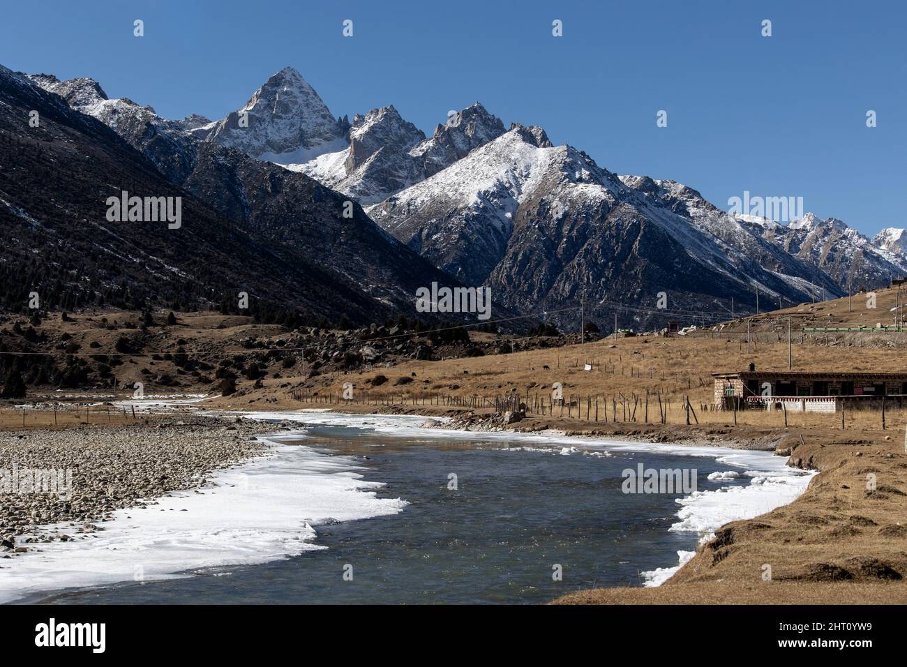 Beautiful view of a valley and tibean snow mountain in the background ...