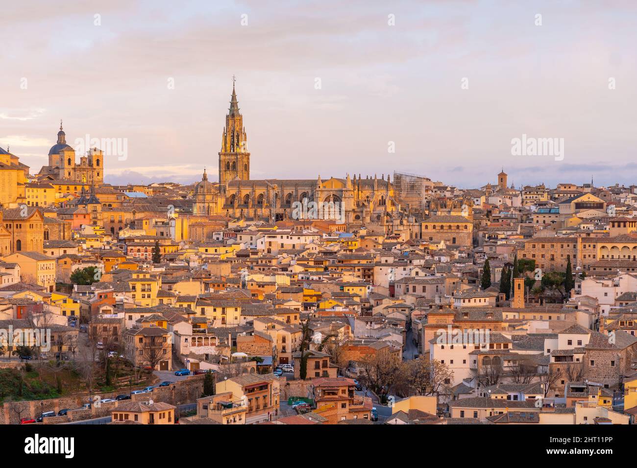 Cityscape of Toledo covered in buildings and cathedrals in the morning ...