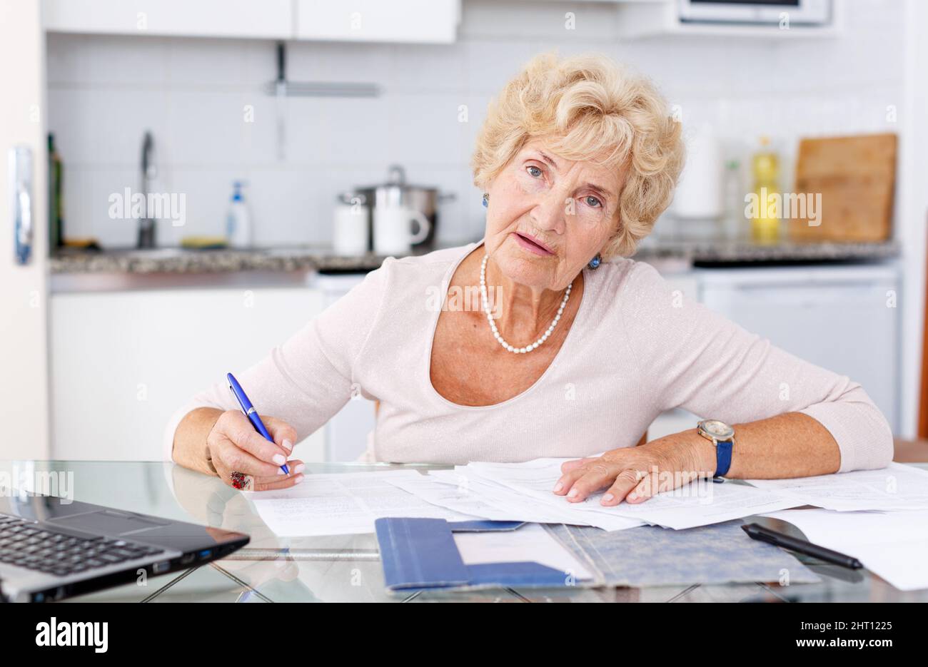 Mature woman documents using hi-res stock photography and images - Alamy