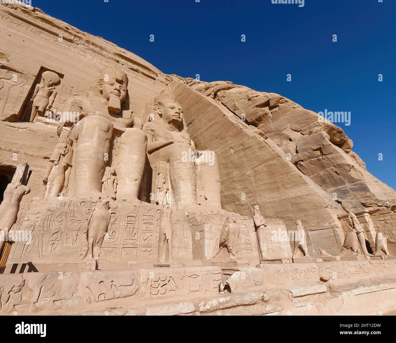 Closeup of statues in front of Abu Simbel temple in Aswan Egypt Stock ...