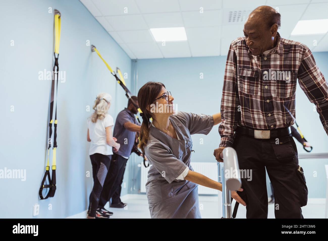 Helping hand to walk hi-res stock photography and images - Alamy