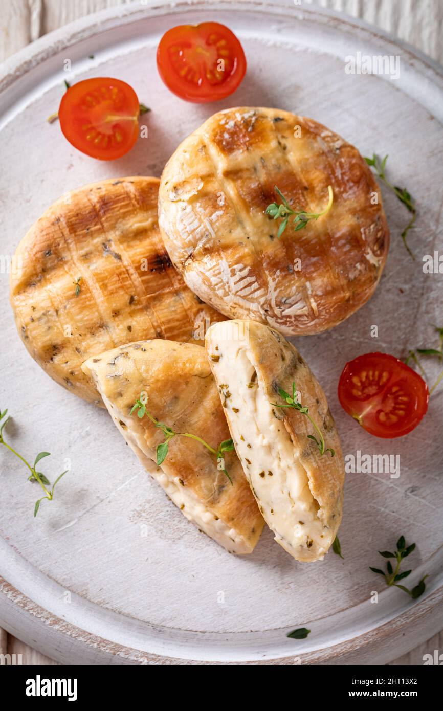 Delicious grilled halloumi cheese on a grill with fire. Halloumi cheese ...